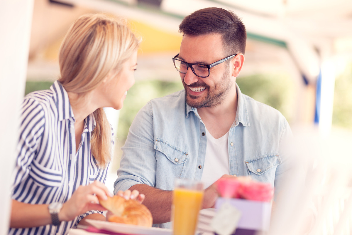 Couple enjoying brunch on vacation